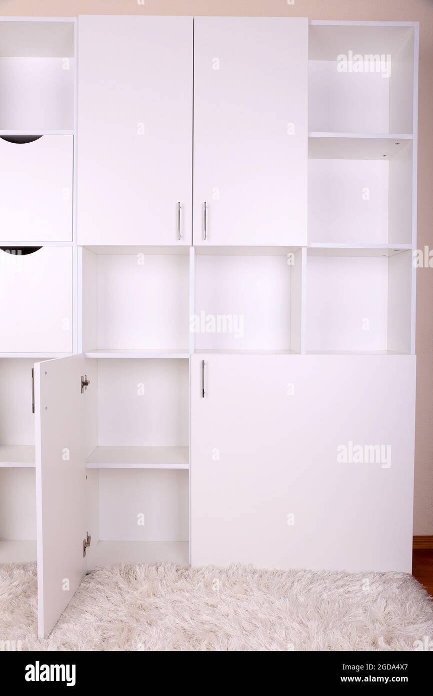 Empty white shelves close up Stock Photo - Alamy