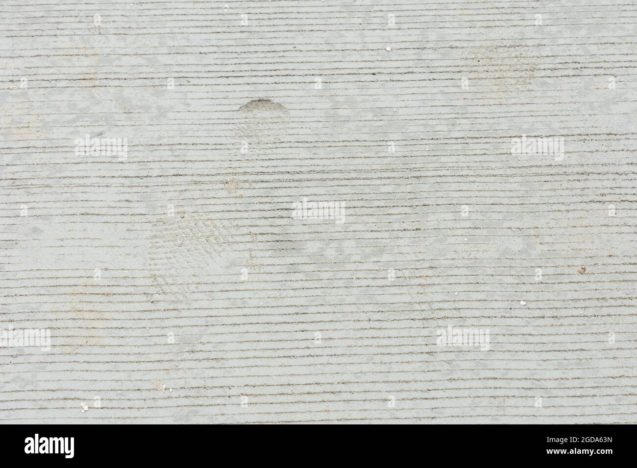 Footprint human on footpath concrete close-up and detail of texture ...