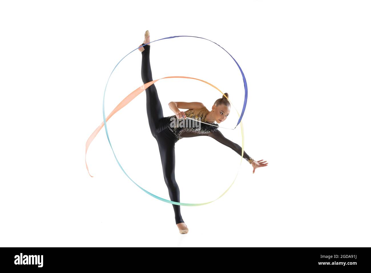 Portrait of little girl, rhythmic gymnastics artist training with ...