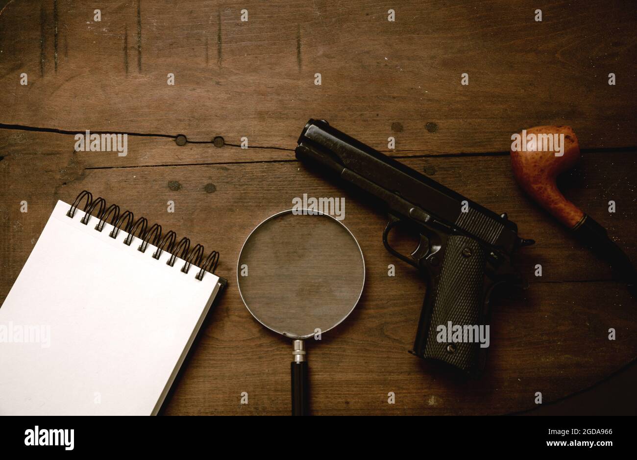 Crime investigation, private detective concept. Pistol and a blank ...