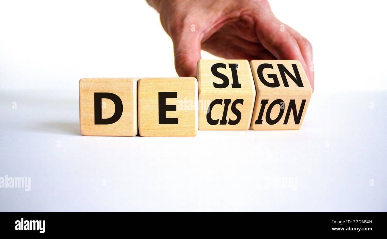 Decision or design symbol. Businessman turns wooden cubes and changes ...