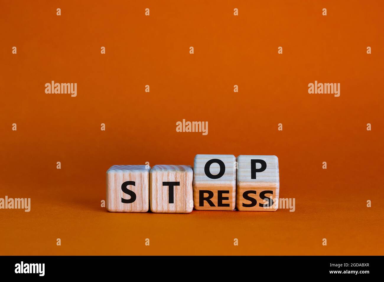 Stop stress and be health symbol. Turned wooden cubes and changed words ...
