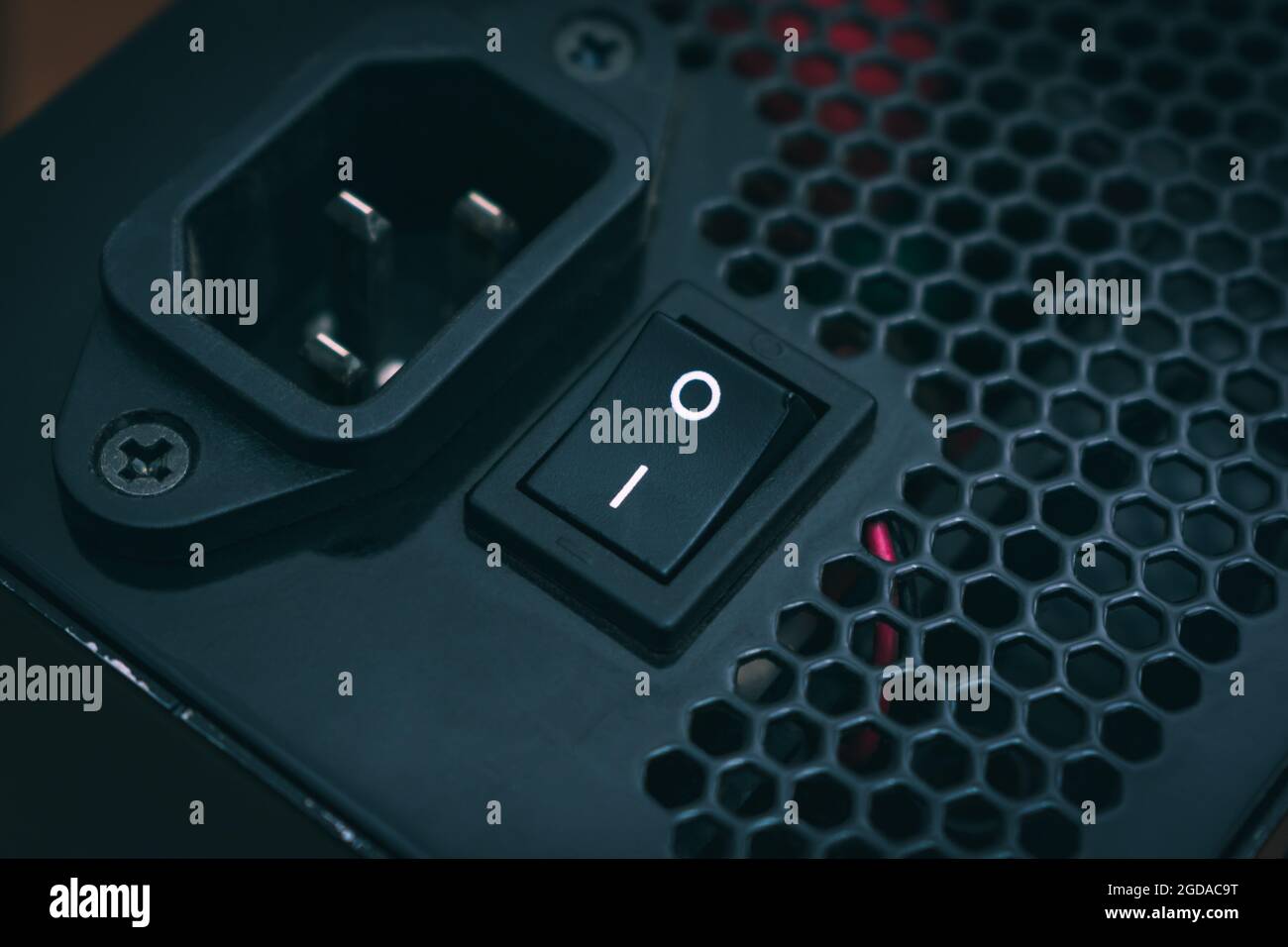 Button and socket of the power supply of a personal computer close-up ...