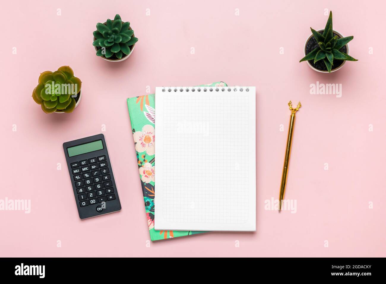 Fashion feminine home office workplace. Notebook, calculator, notepad ...