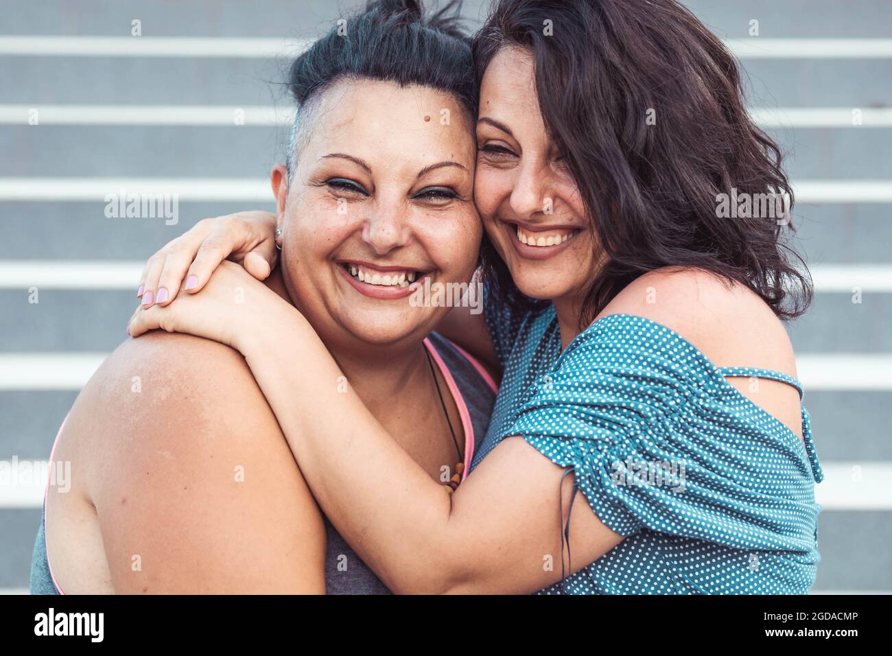 Adult twins with difference hi-res stock photography and images - Alamy