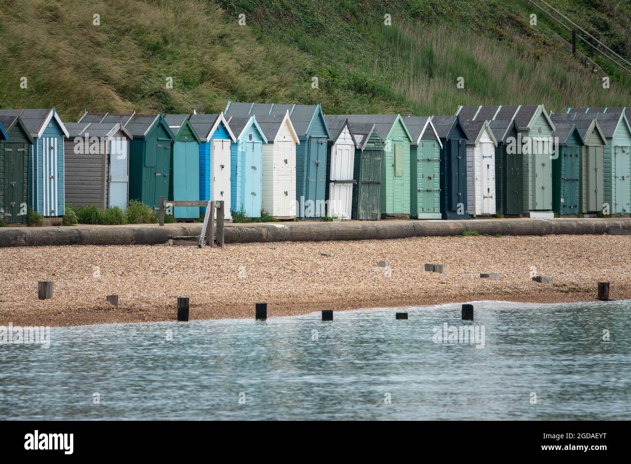 Multi coloured beach huts hi-res stock photography and images - Alamy