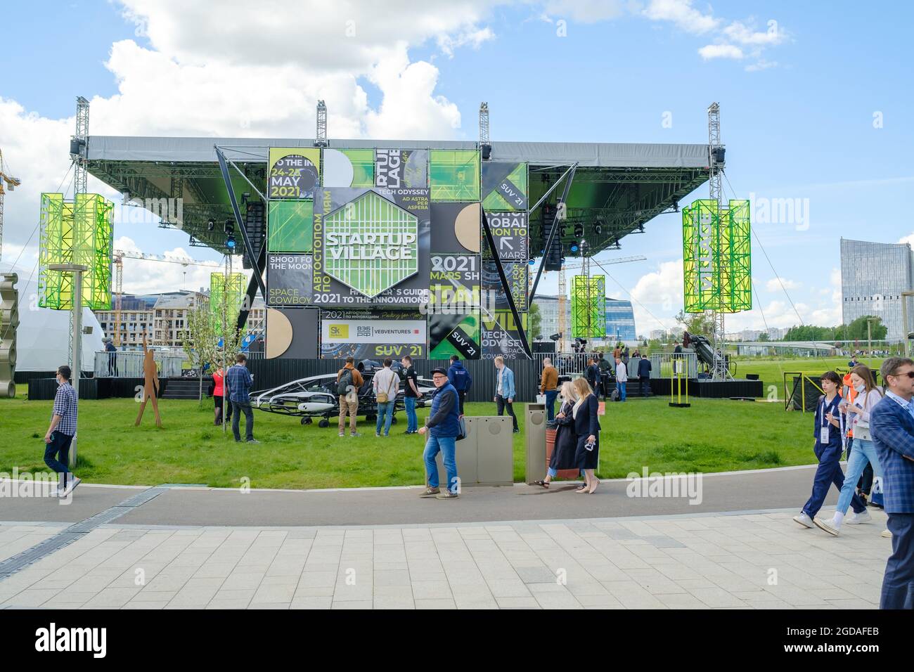 People gathering in park during business event Stock Photo - Alamy