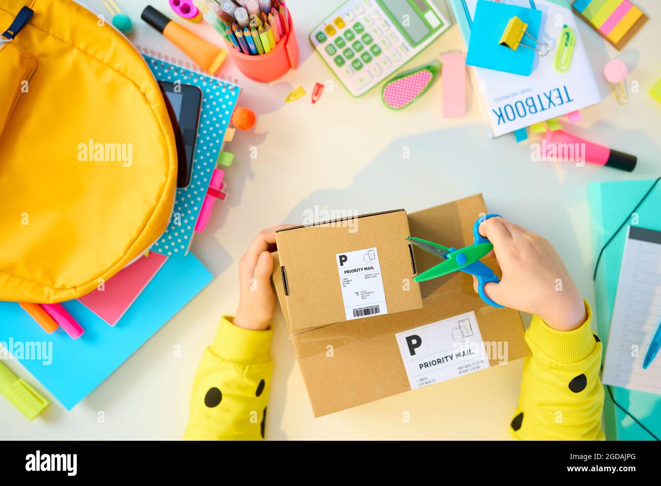 Back to school. Upper view of modern school girl with workbooks ...