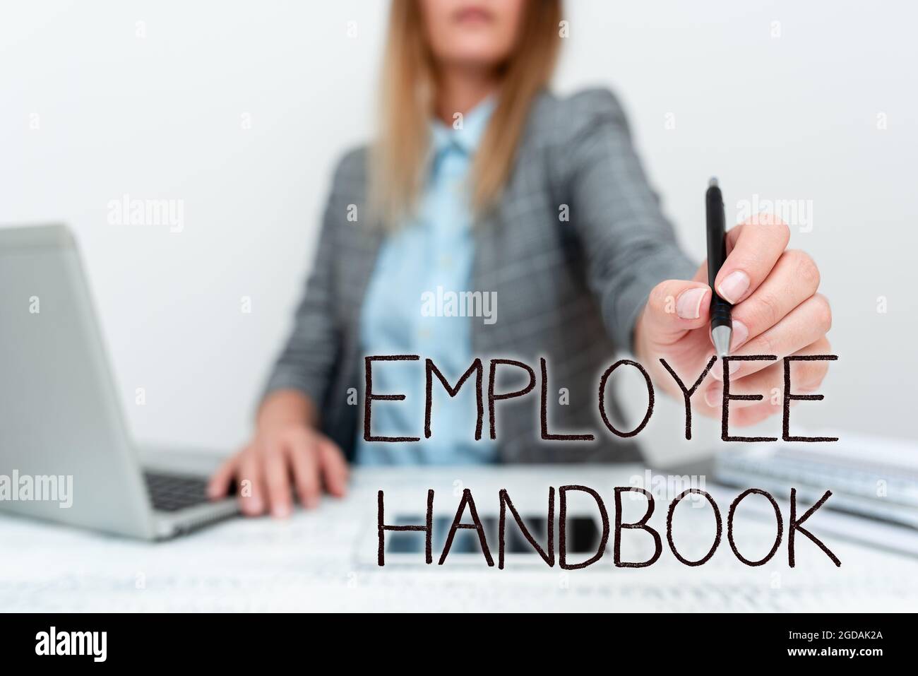 Handwriting text Employee Handbook. Concept meaning states the rules ...
