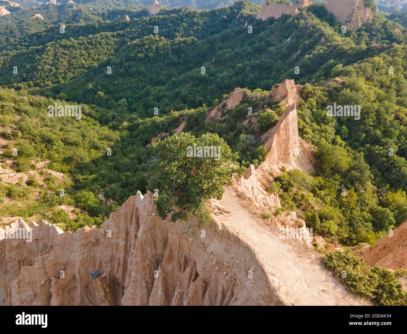 Aerial sunset view of Rozhen sand pyramids, Blagoevgrad region ...