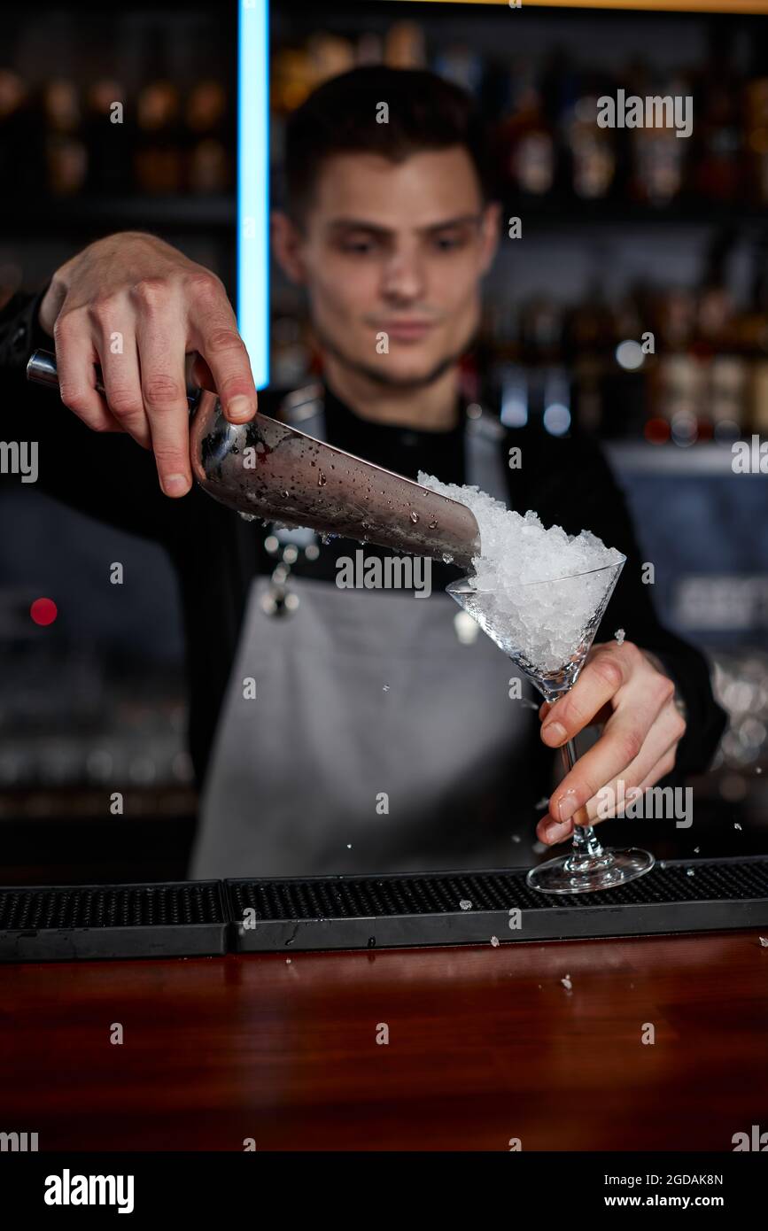 Barman pours transparent drink cocktail hi-res stock photography and images - Alamy