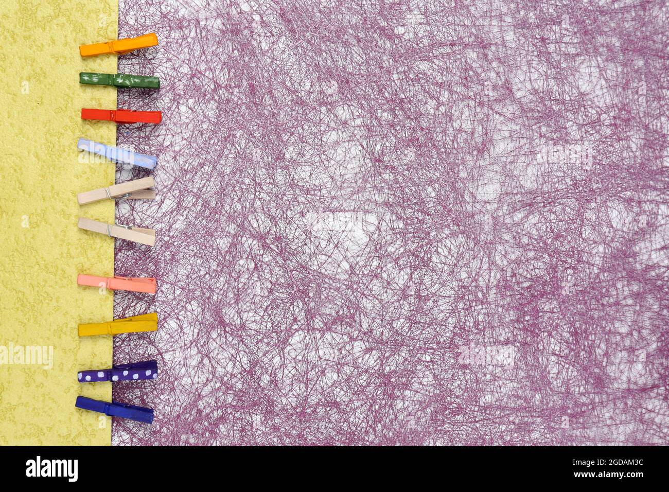 Abstract background with colorful wooden pins and paper Stock Photo - Alamy