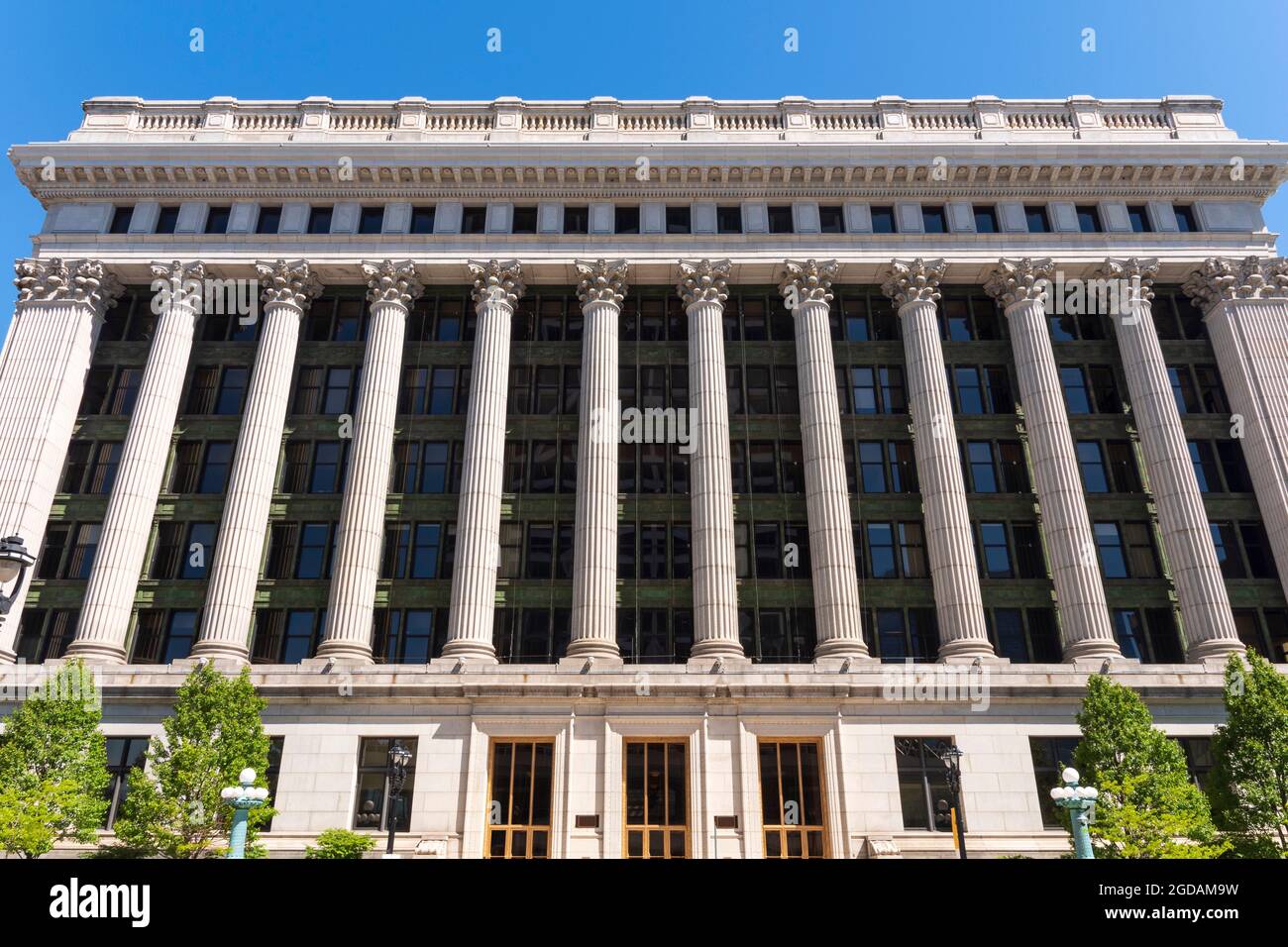 entrance and columnated facade of historic neoclassical style office ...