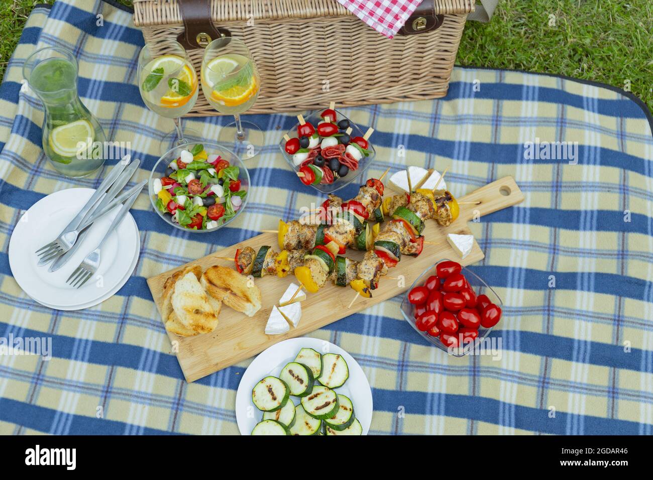 Top view of tasty food on a plaid blanket for a picnic Stock Photo - Alamy
