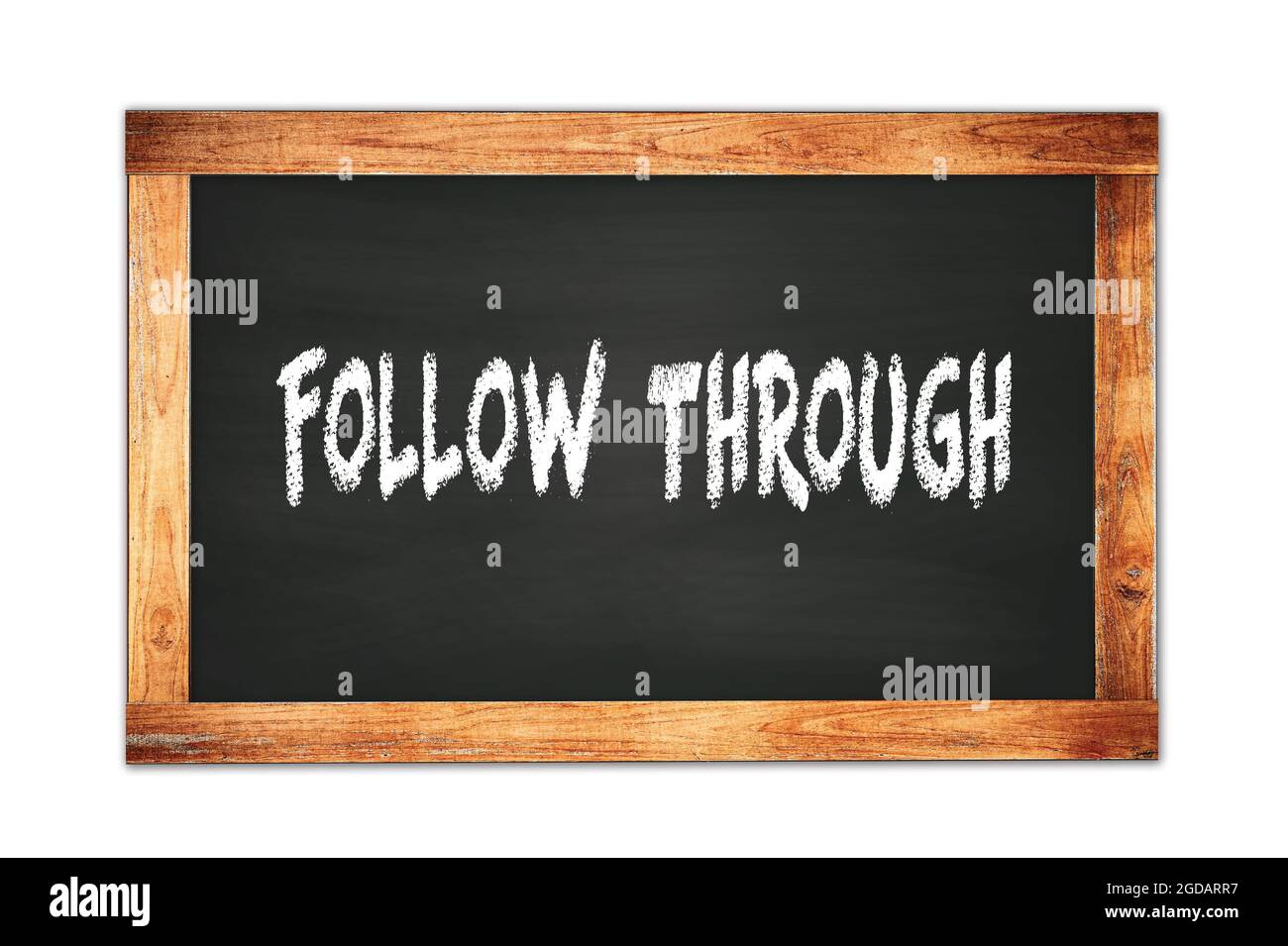 FOLLOW THROUGH text written on black wooden frame school blackboard ...