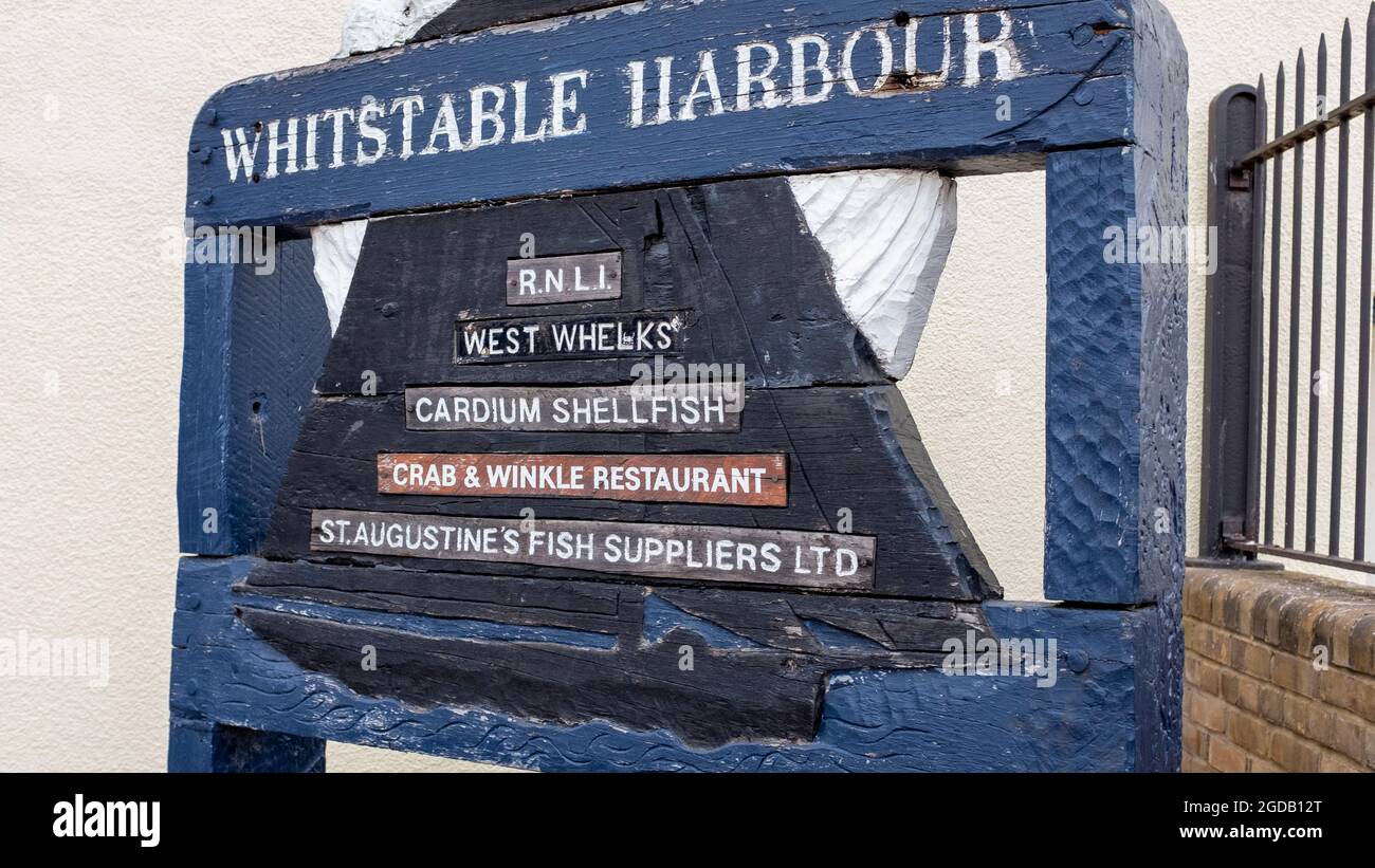 Whitstable Harbour sign Stock Photo - Alamy