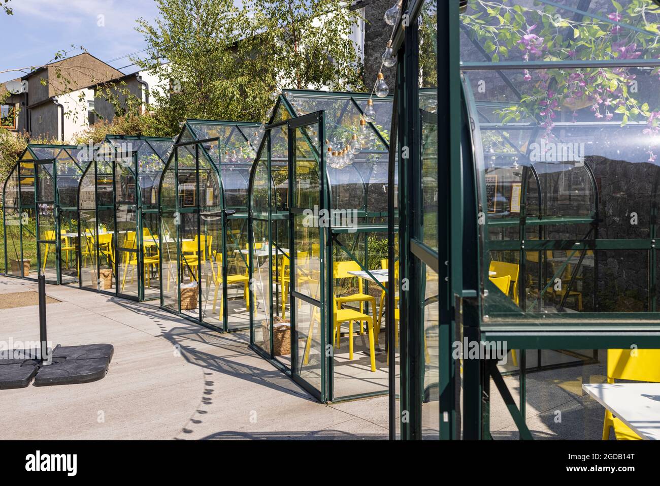 Individual segregated dining areas in glazed units at the garden ...