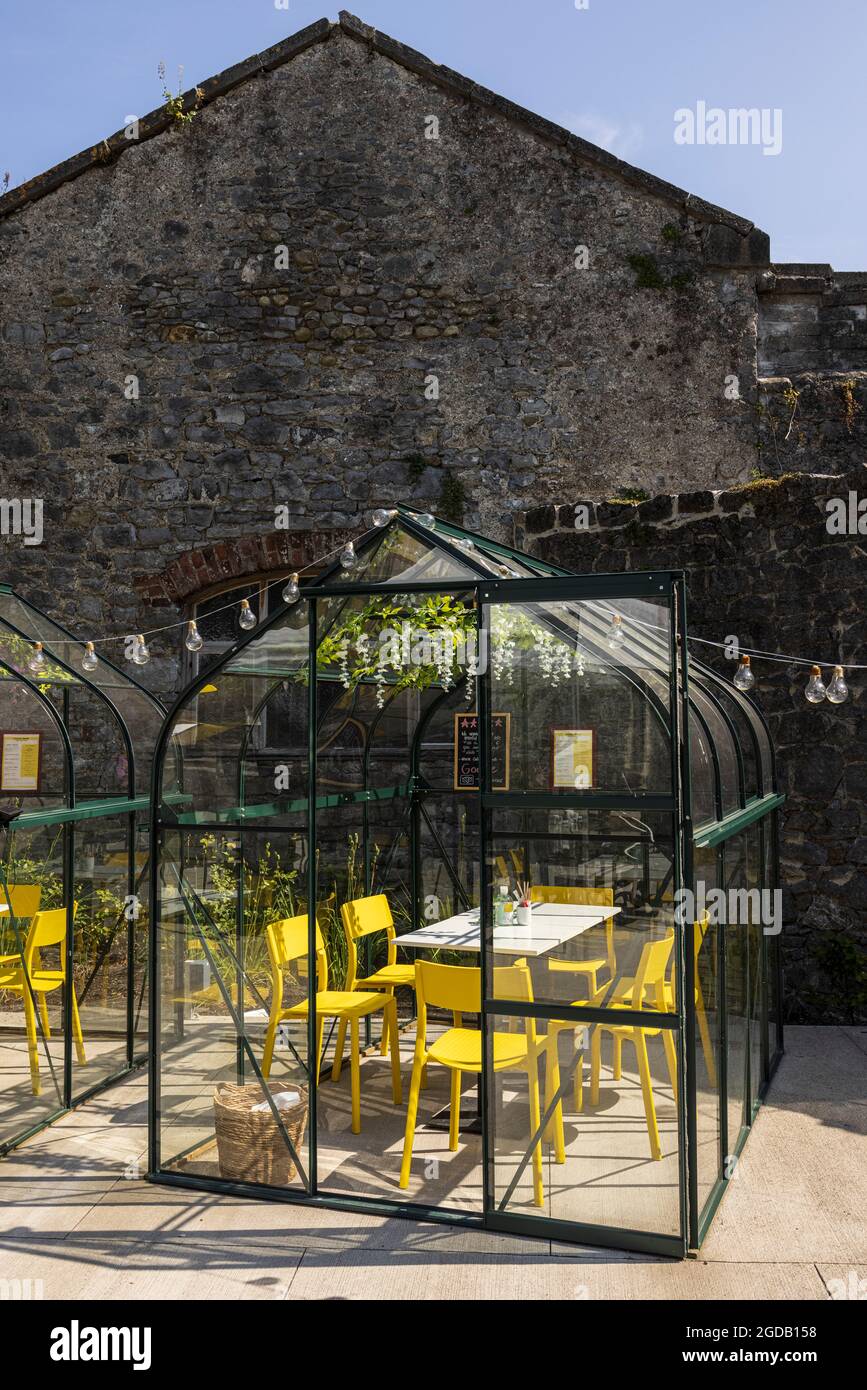 Individual segregated dining areas in glazed units at the garden ...