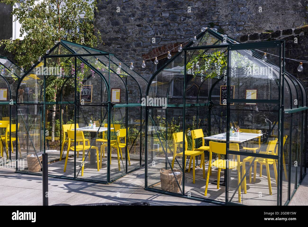 Individual segregated dining areas in glazed units at the garden ...
