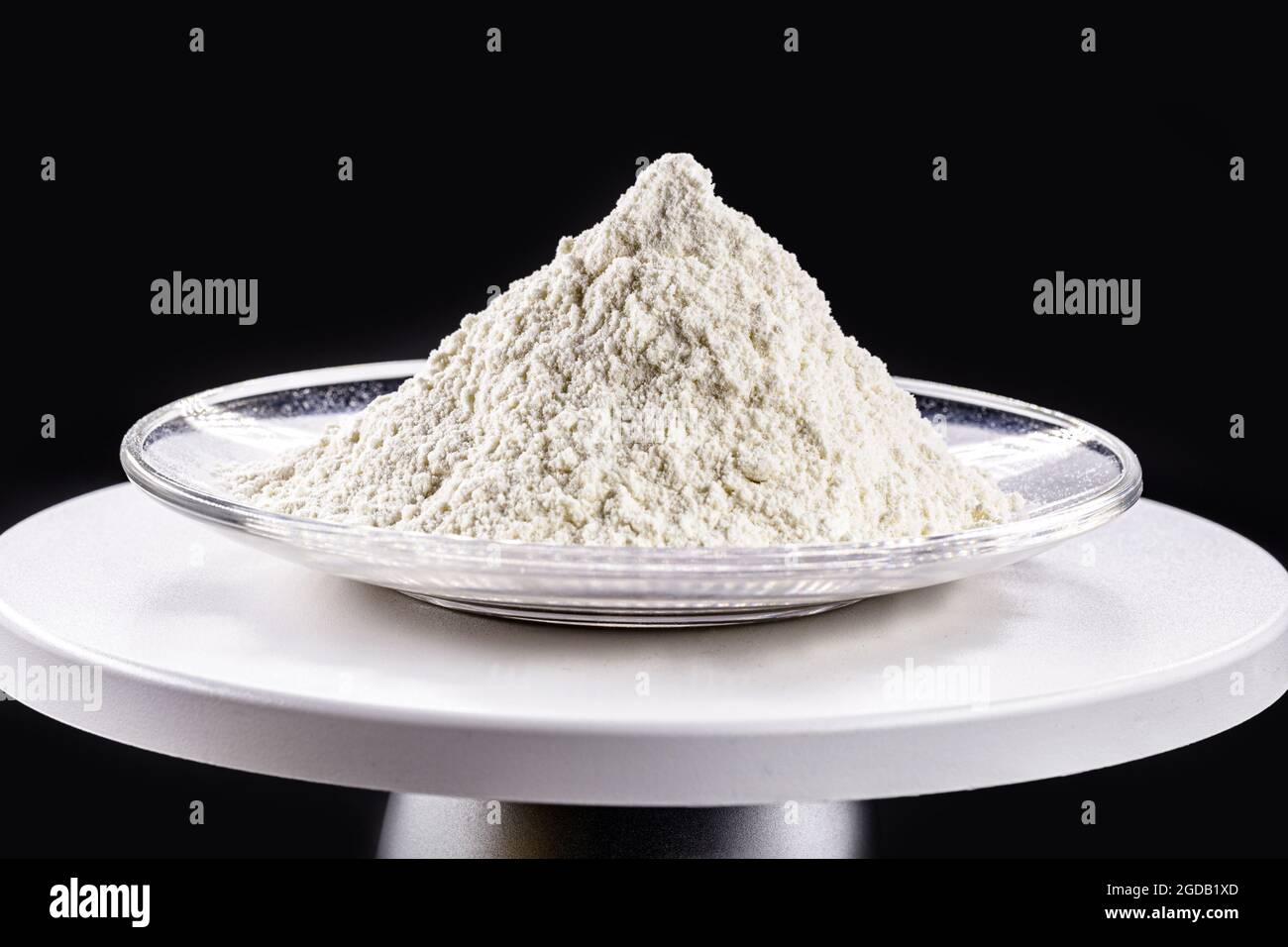 Pile of calcium sulfate on white background, known as micronized ...