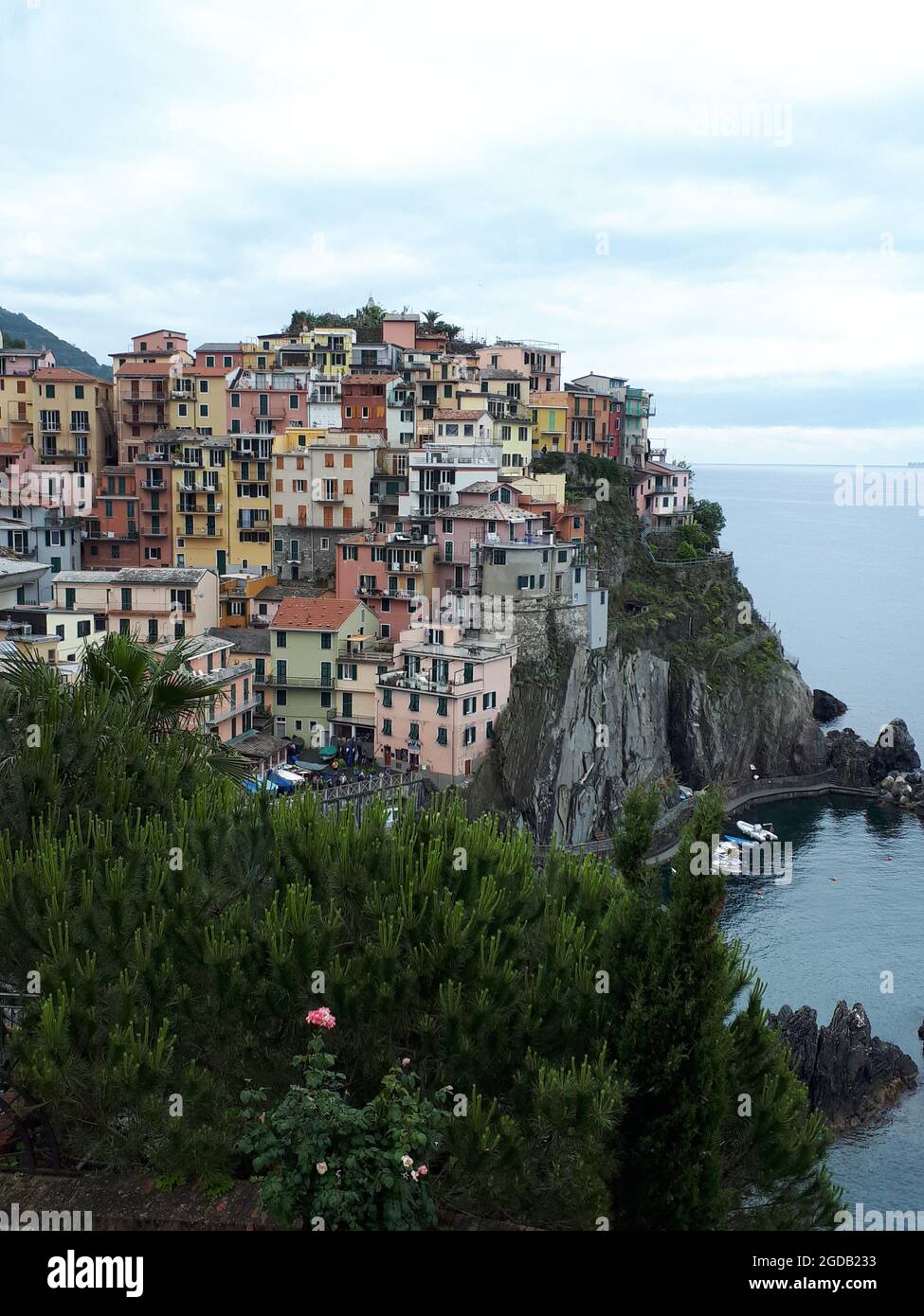 Italian national park at the seashore of Manarola and colorful houses ...