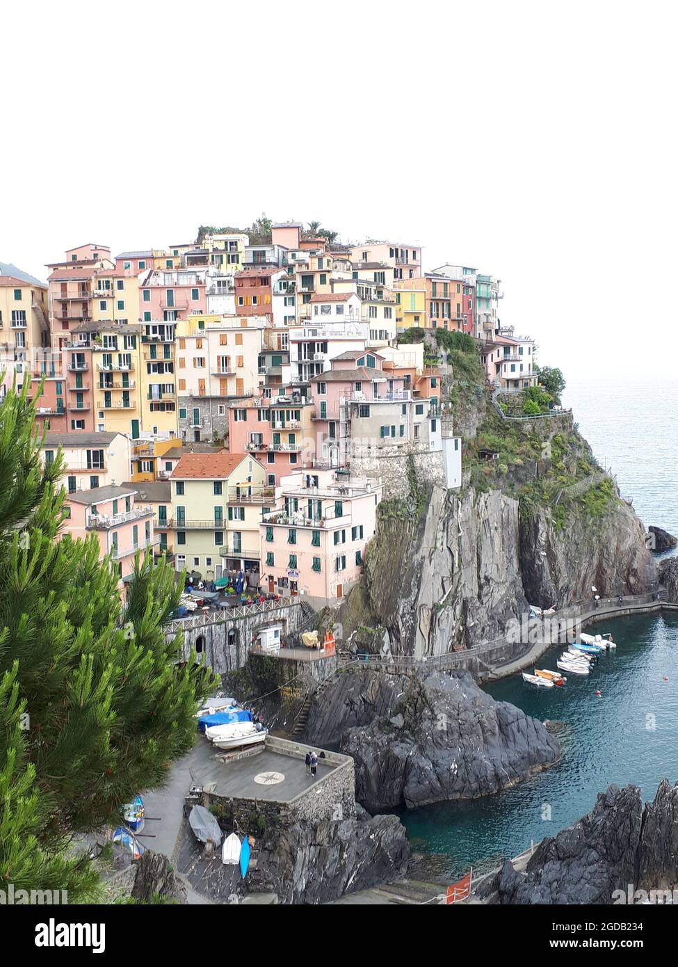 Italian national park at the seashore of Manarola and colorful houses ...