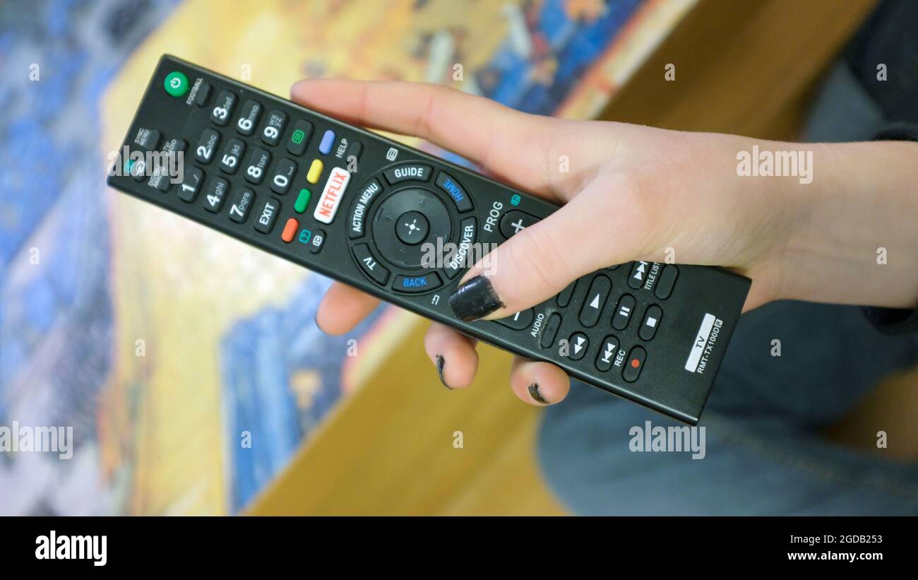 The TV remote in use to change the channel Stock Photo - Alamy