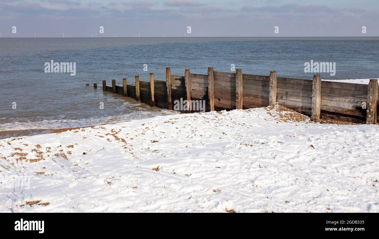 Snow on the beach Stock Photo - Alamy