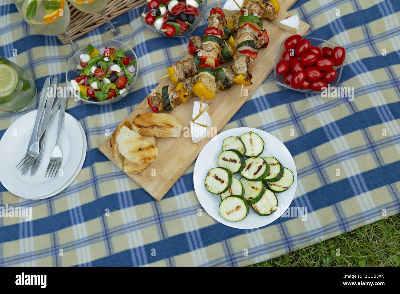 Top view of tasty food on a plaid blanket for a picnic Stock Photo - Alamy