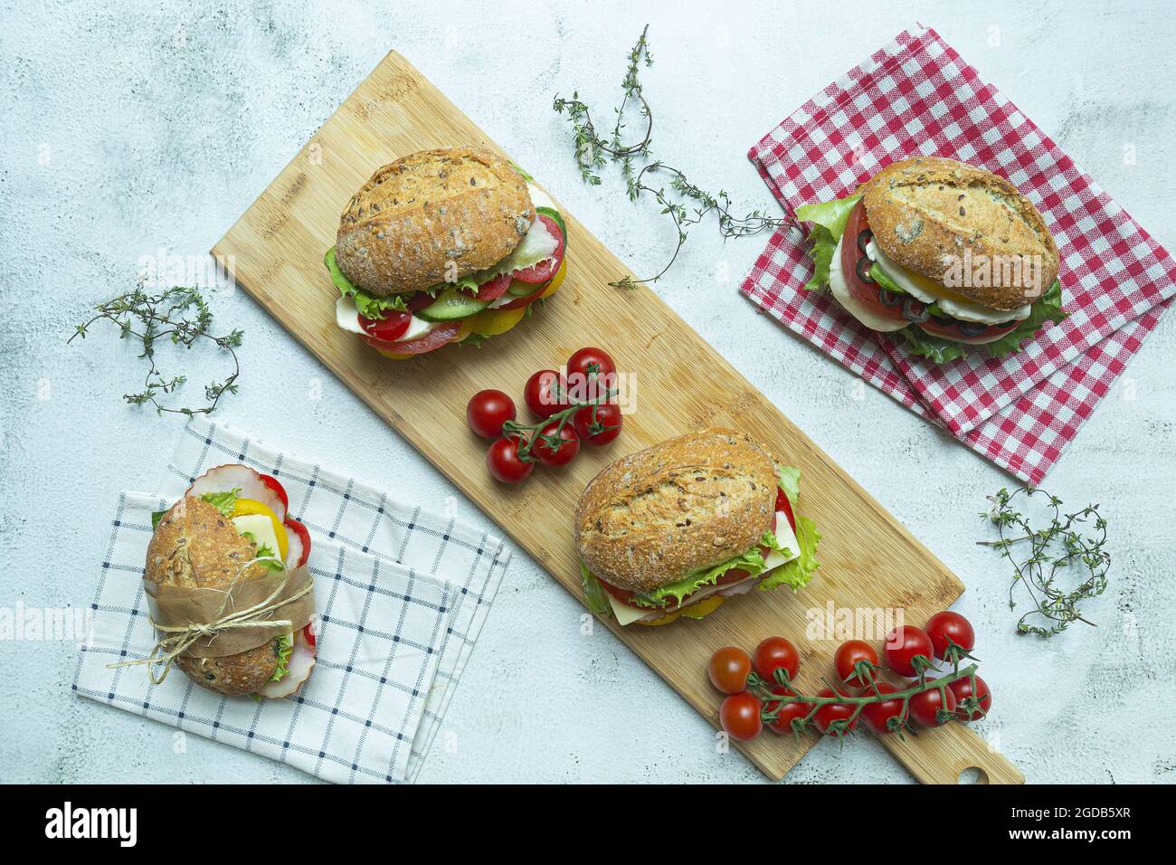 Top view of sandwiches and cherry tomatoes Stock Photo - Alamy