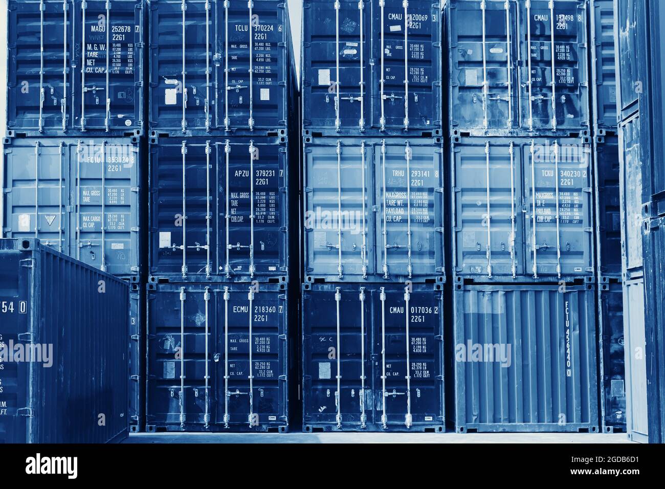 container cargo stack on logistic port warehouse blue color tone for ...