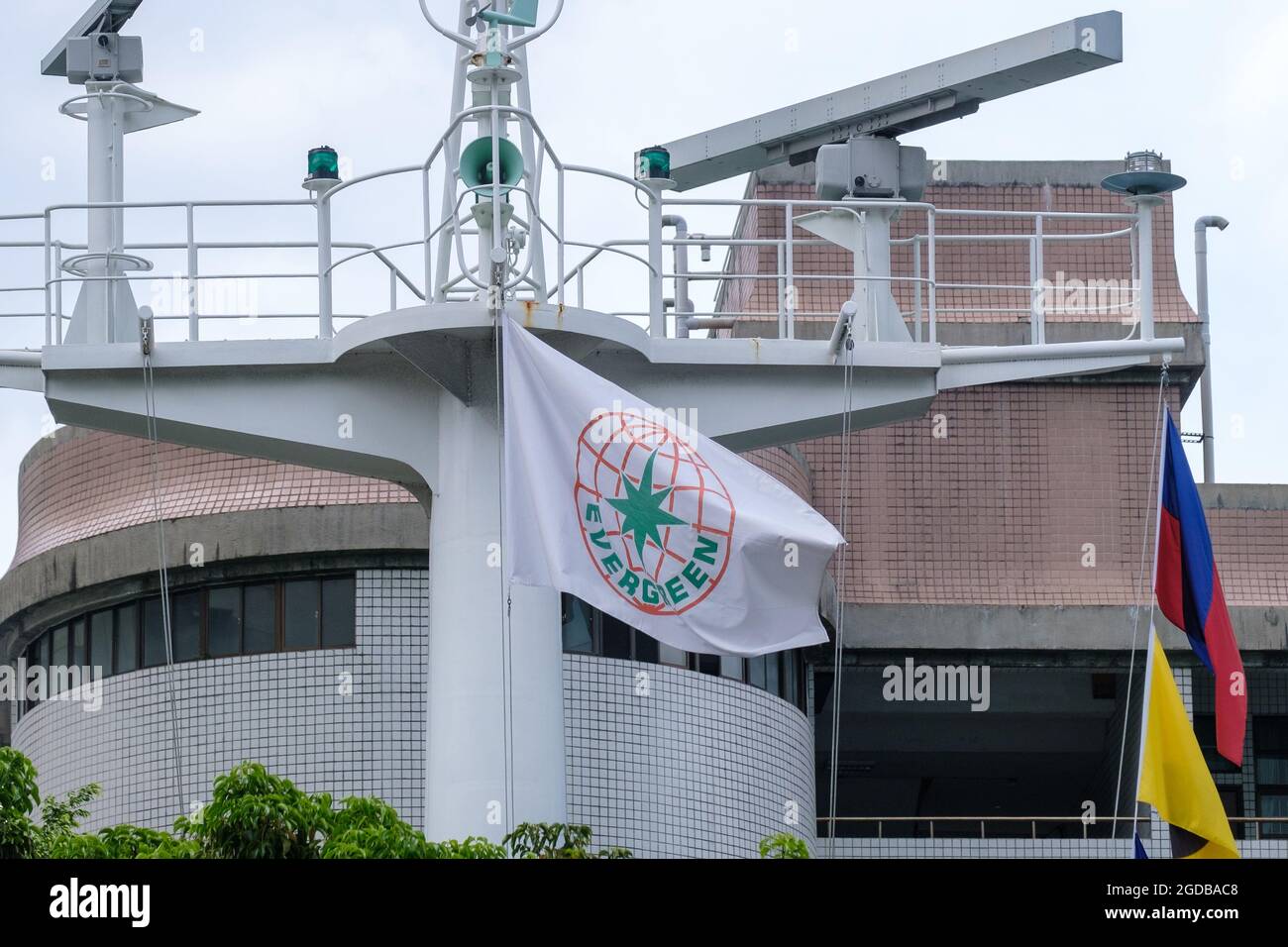 The logo of Evergreen Marine Corporation seen on a flag at the company ...