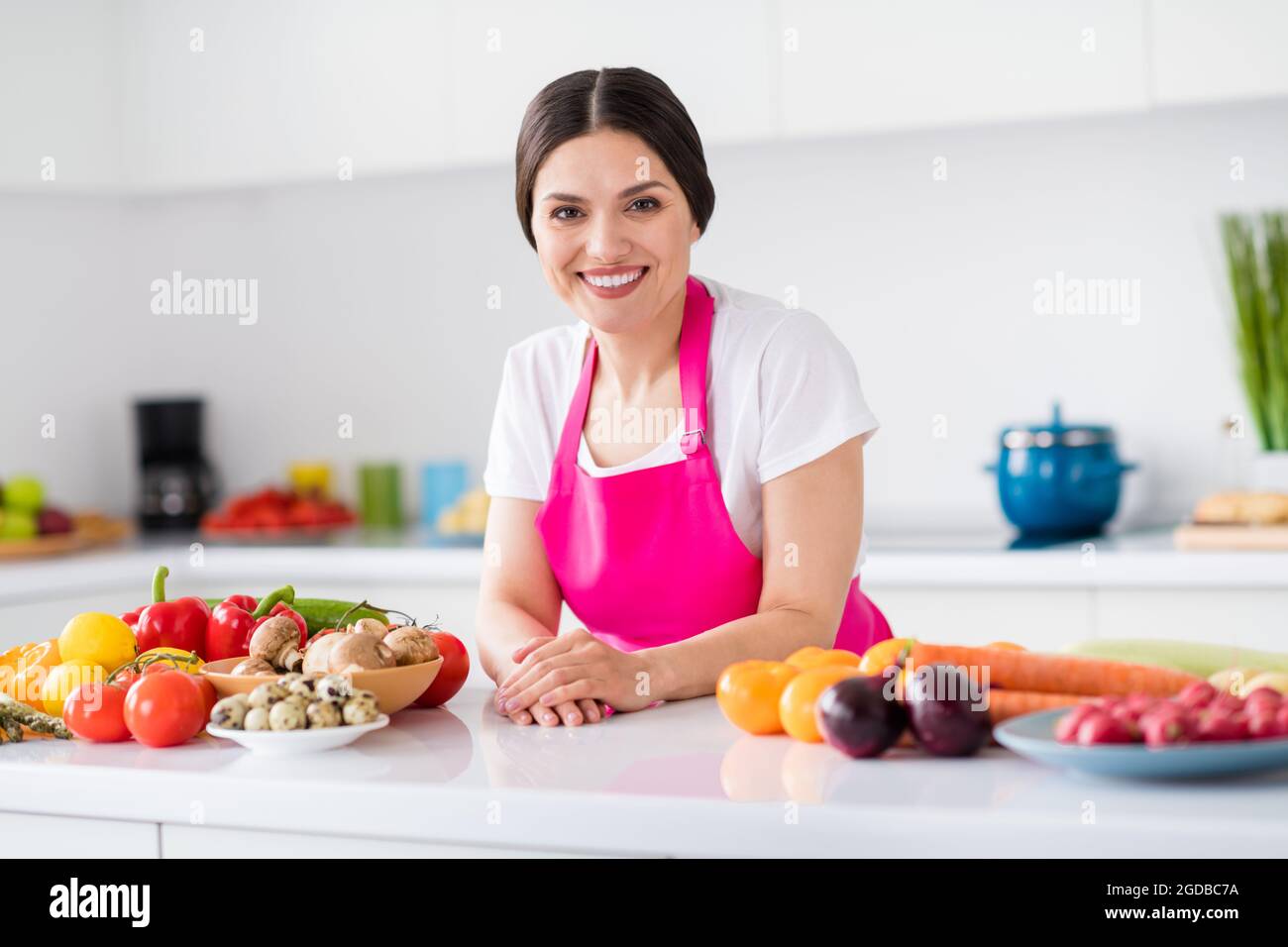 Photo of nice brunette hair millennial lady cook from home wear white t ...