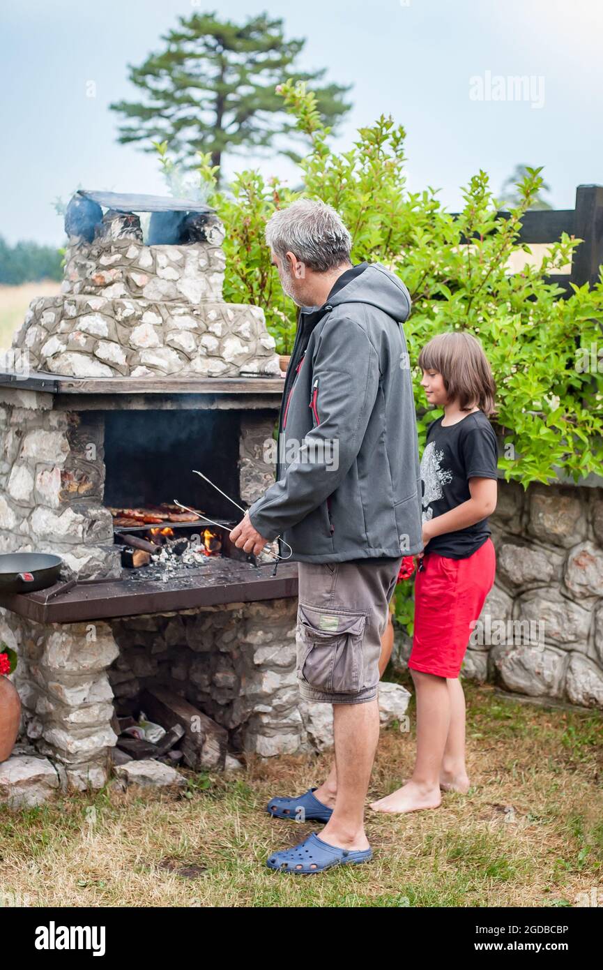 Father son cheers hi-res stock photography and images - Alamy