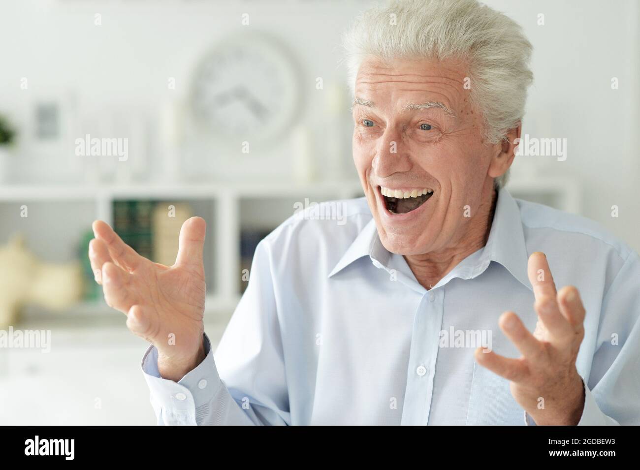 Close up portrait of happy senior man at home Stock Photo - Alamy