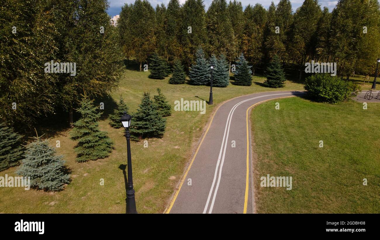 Road winds among trees hi-res stock photography and images - Alamy