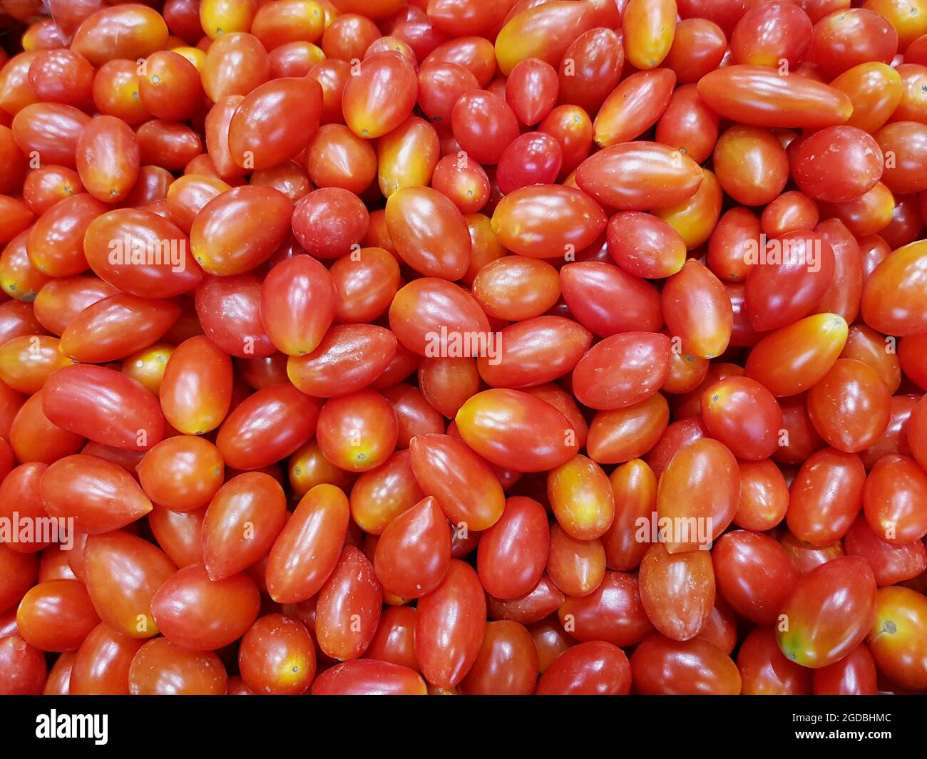 Cherry tomatoes extreme close hi-res stock photography and images - Alamy