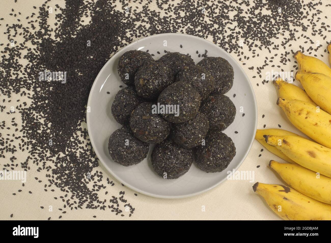Traditional Indian sweet balls made with sesame seeds, jaggery and ...