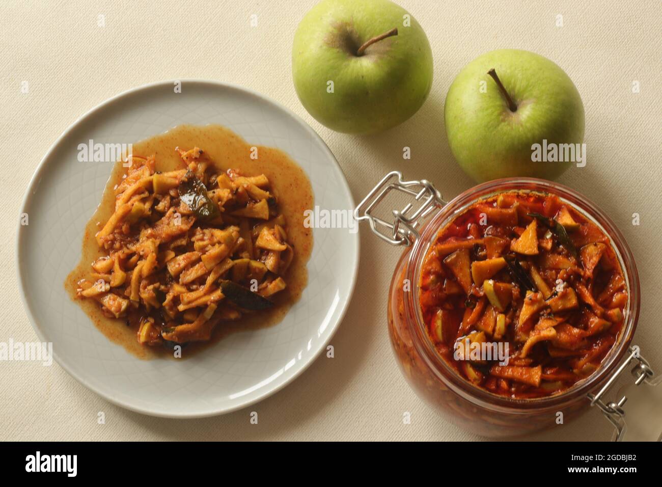 Sweet and spicy Pickled Green apple or achar made with finely sliced ...