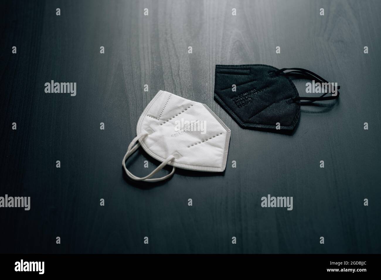 Top view of two black and white face masks Stock Photo - Alamy