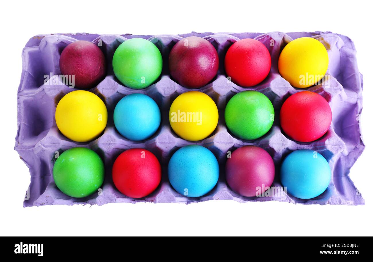 Colorful Easter eggs in tray isolated on white Stock Photo - Alamy