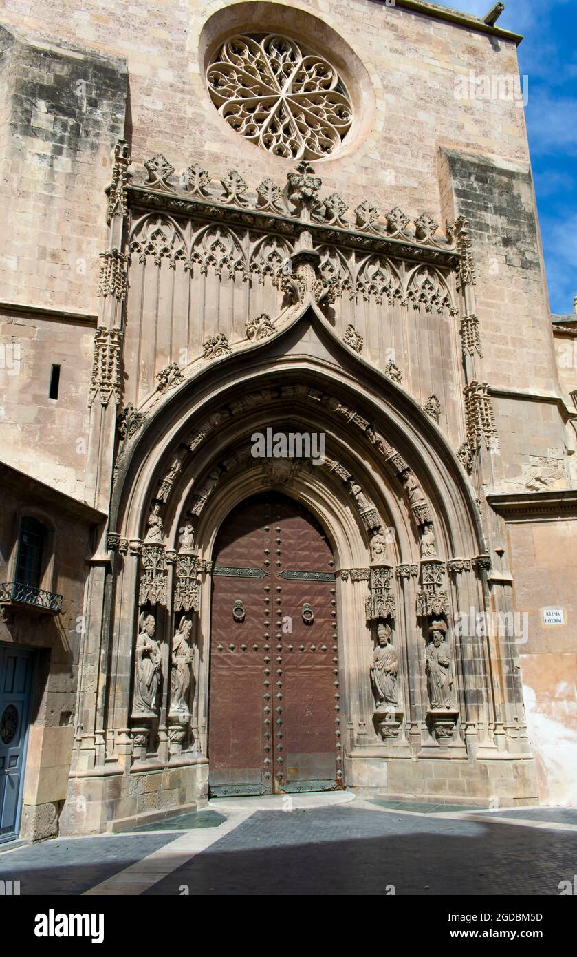 A view of a beautiful, arched doorway at the ancient Murcia cathedral ...
