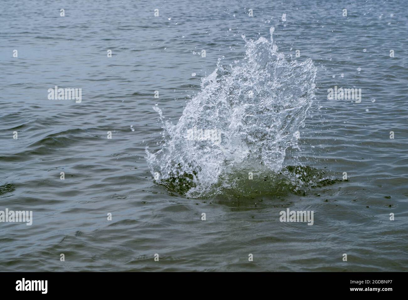 Rapid and expressive splash of water like explosion on the sea area ...