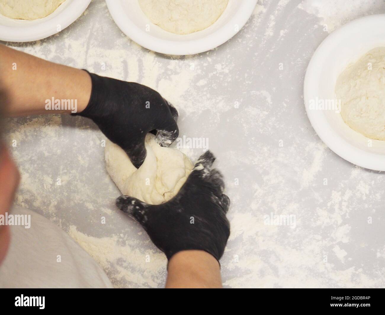 Homemade bread and Baker making bread Stock Photo - Alamy