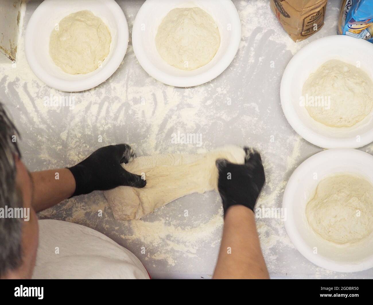 Homemade bread and Baker making bread Stock Photo - Alamy