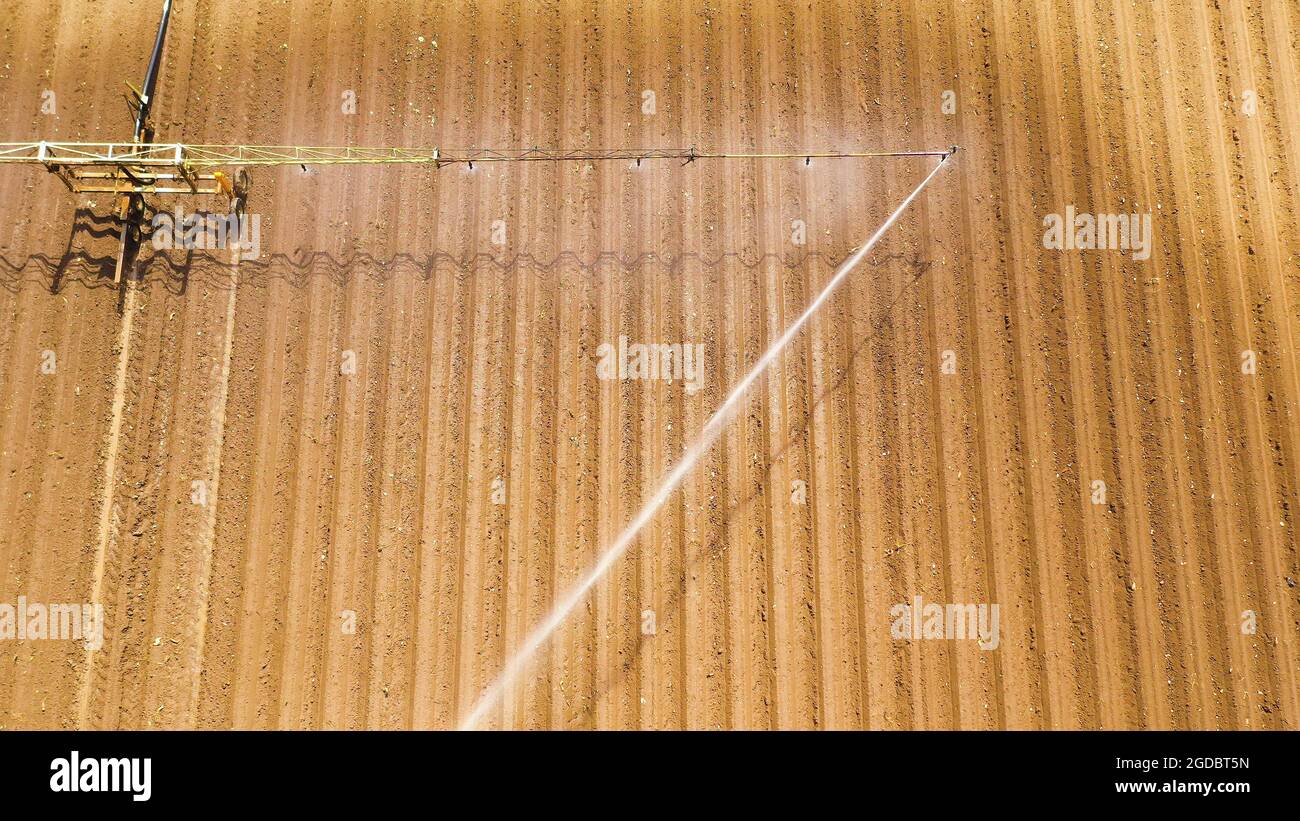 aerial view Center pivot agriculture irrigation machine of crops. An ...