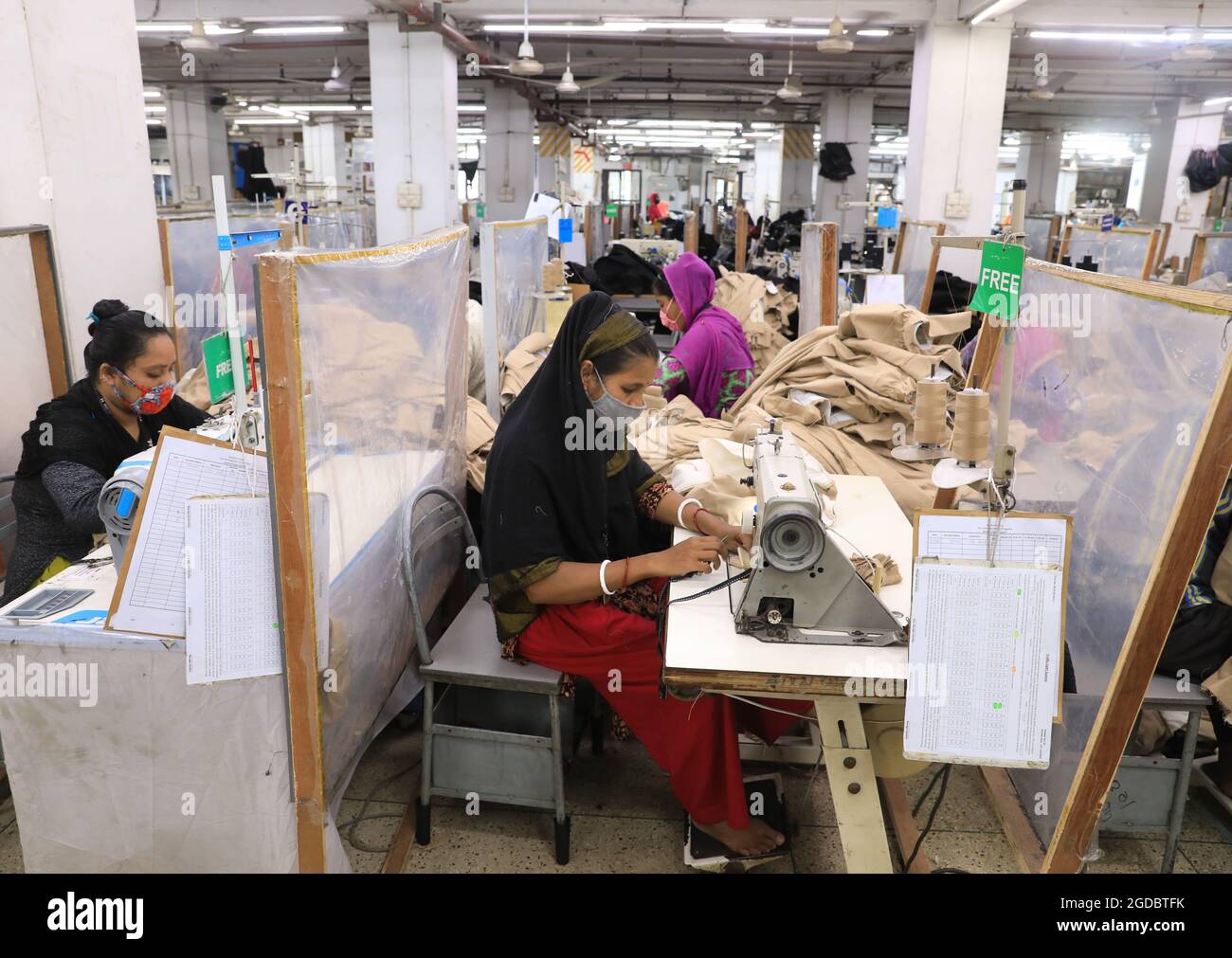 August 12, 2021,Dhaka,Bangladesh: Garment workers work at a factory ...
