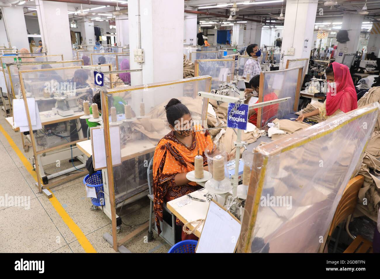 August 12, 2021,Dhaka,Bangladesh: Garment workers work at a factory ...