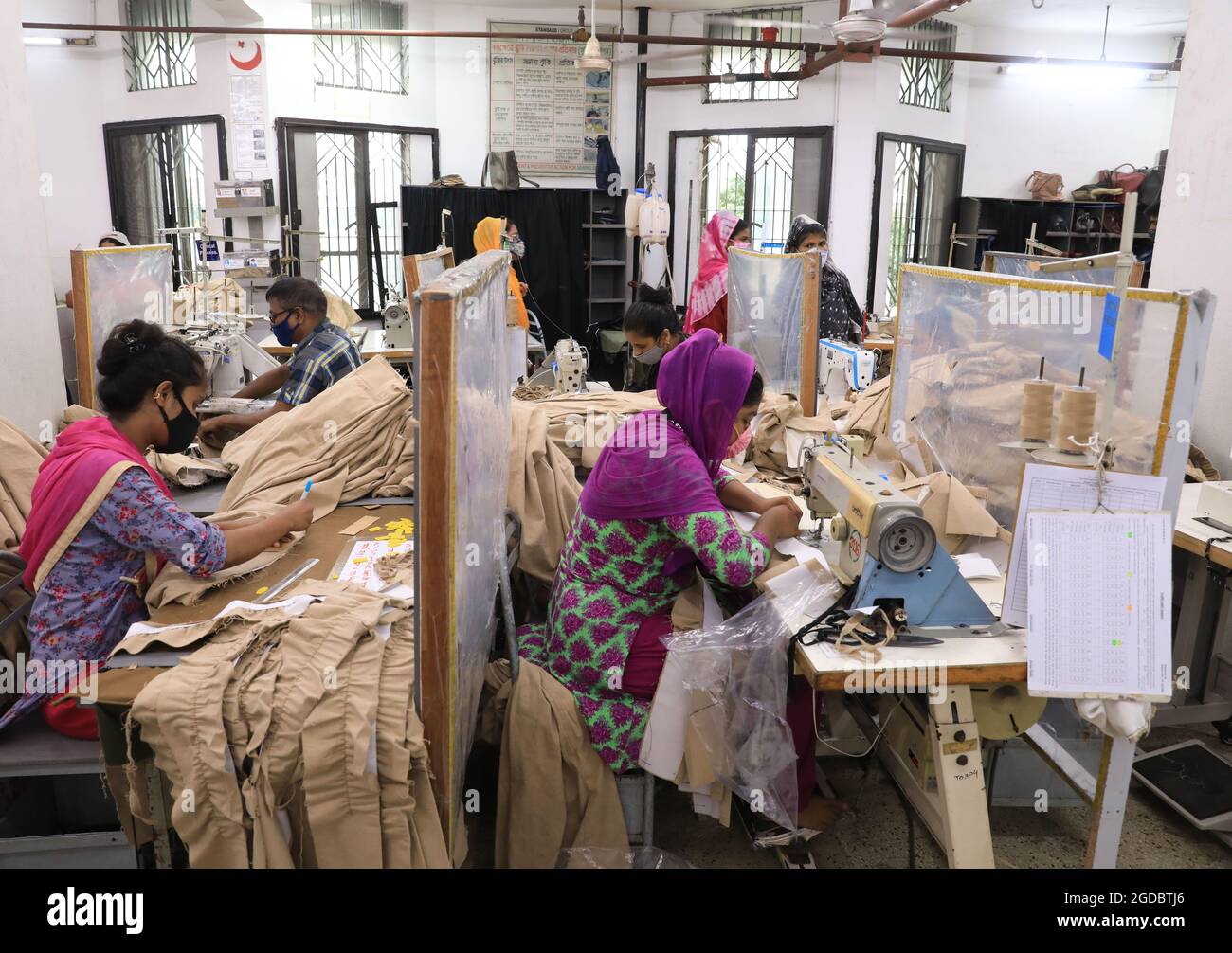 August 12, 2021,Dhaka,Bangladesh: Garment workers work at a factory ...