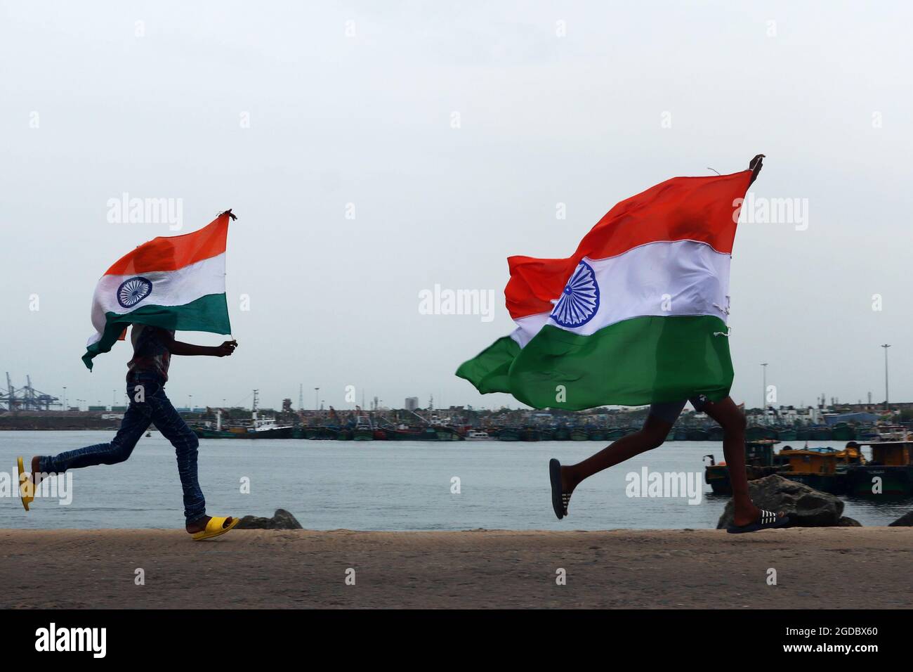 Chennai, Tamil Nadu, India. 12th Aug, 2021. Children are seen carrying ...